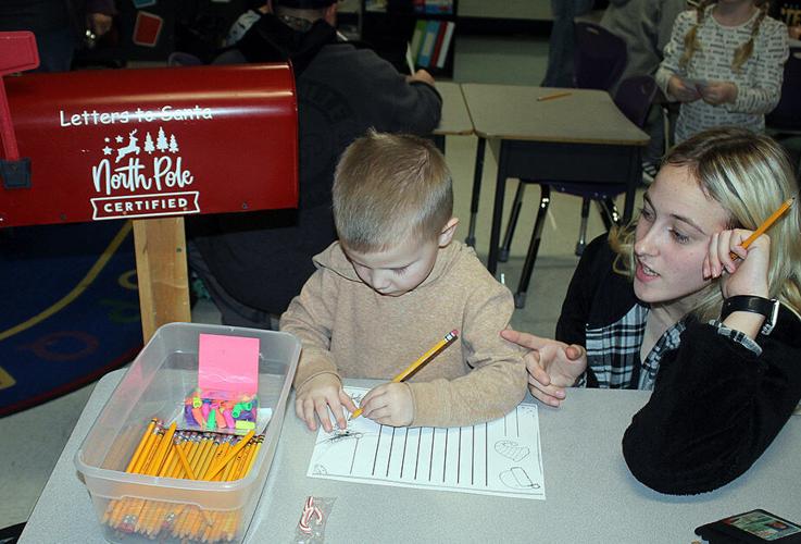 Visiting Santa in pajamas at CGES | Education | pmg-ky1.com