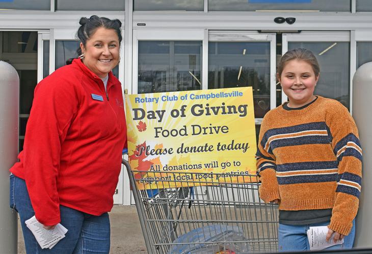 Local Rotary Club collects donations during Day of Giving | Features ...