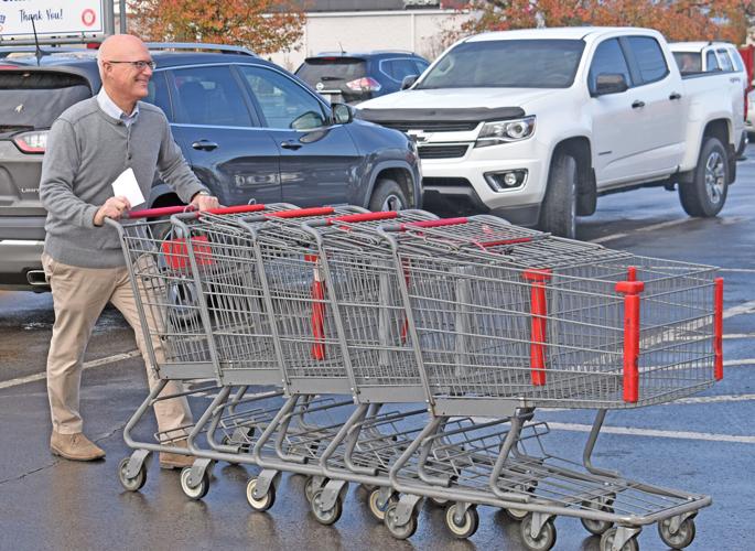 Local Rotary Club collects donations during Day of Giving | Features ...