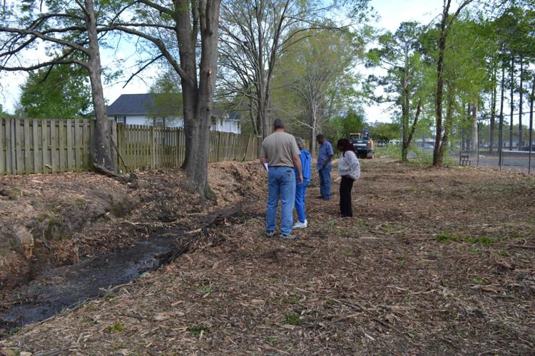 CLEANING OUT DITCHES | | pmg-sc.com