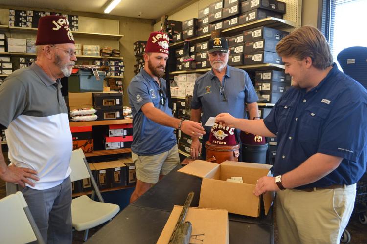 Shriners' Jamil Flyers hold raffle at Crossroads Outdoors | | pmg-sc.com