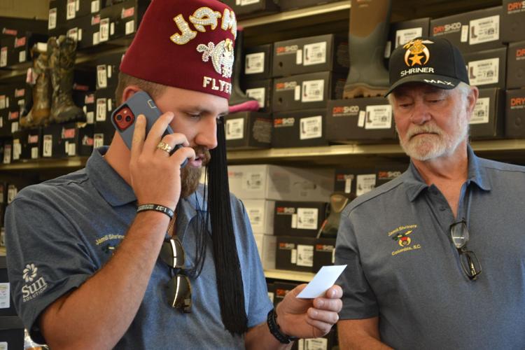 Shriners' Jamil Flyers hold raffle at Crossroads Outdoors | | pmg-sc.com