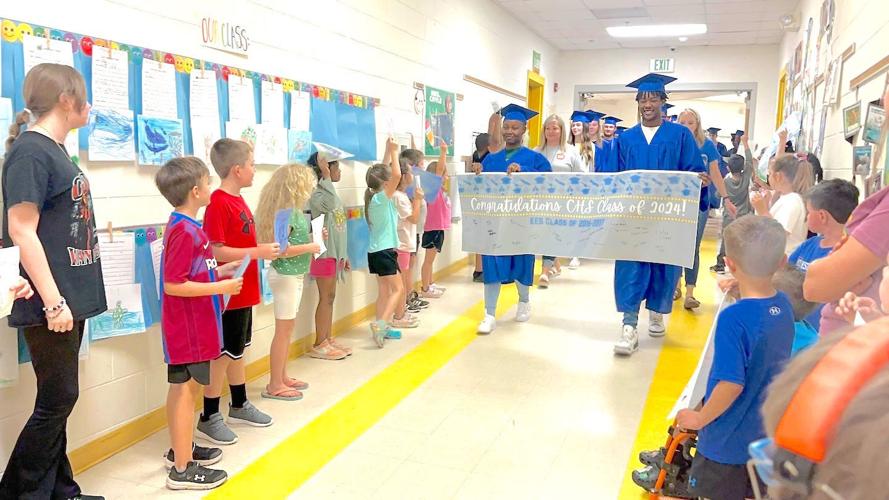Graduating seniors walk through former schools | Progressive Journal ...