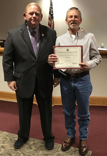 City employee honored at council meeting | News | pmg-va.com