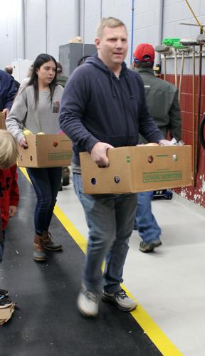 Food box packers break record | News | pmg-va.com