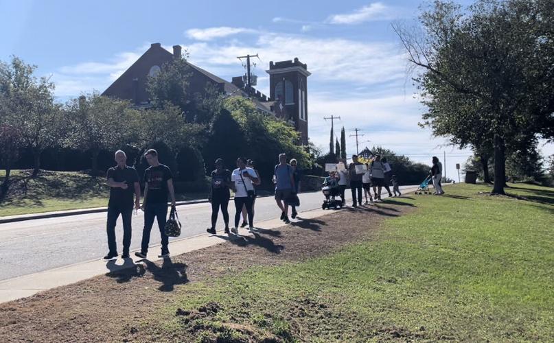 Dozens march to downtown Columbia homeless shelter in protest of city ...