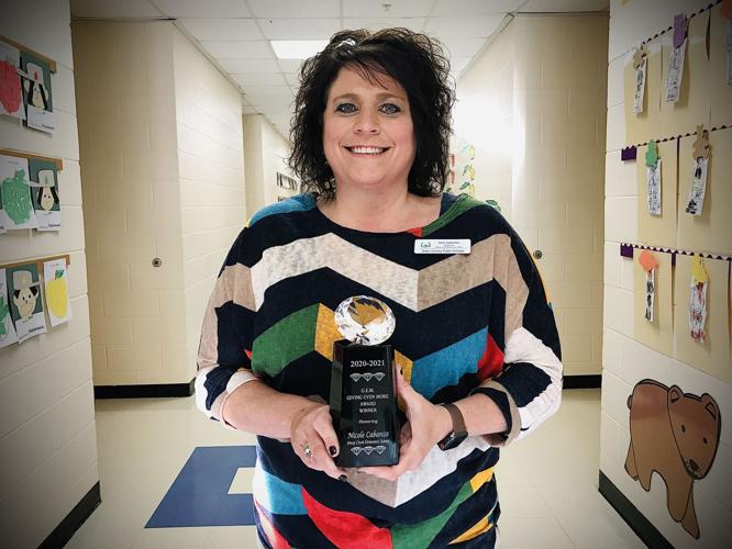 Mossy Creek Elementary bookkeeper honored for ‘Giving Even More’ in ...
