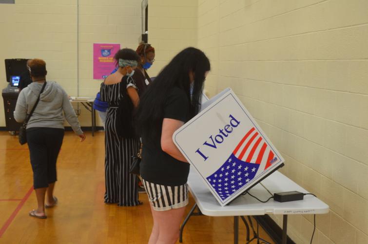 Odell Weeks satellite absentee voting location sees steady stream of ...