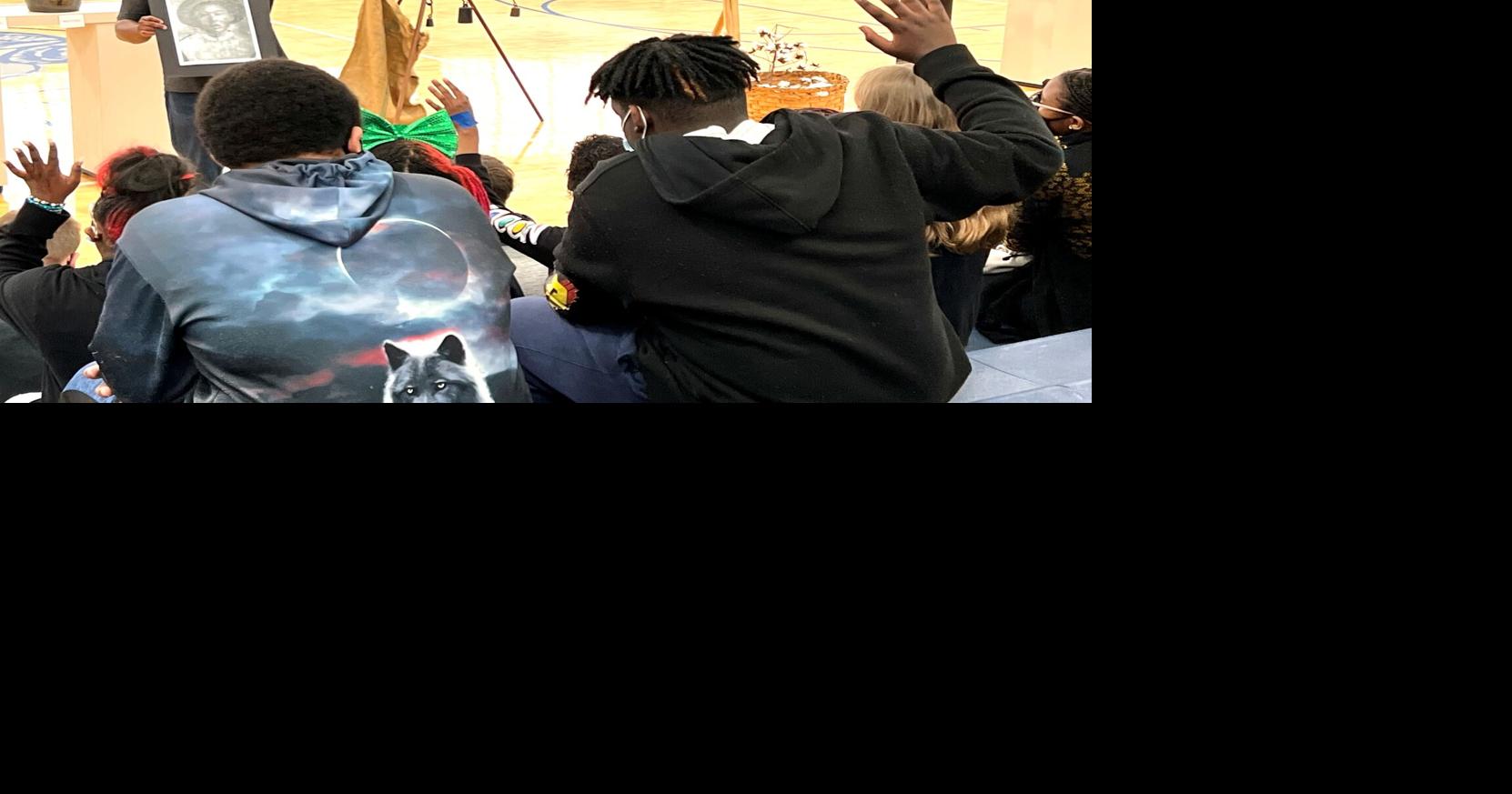 Local author brings historical exhibition to Schofield Middle School