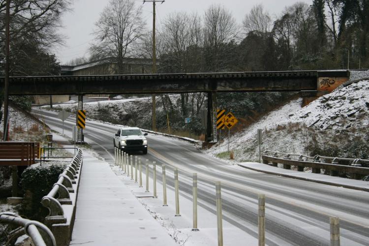 Photos: Snowstorm brings Spartanburg's first snow in 3 years