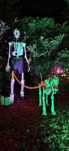 12-foot skeletons deck the halls long past Halloween