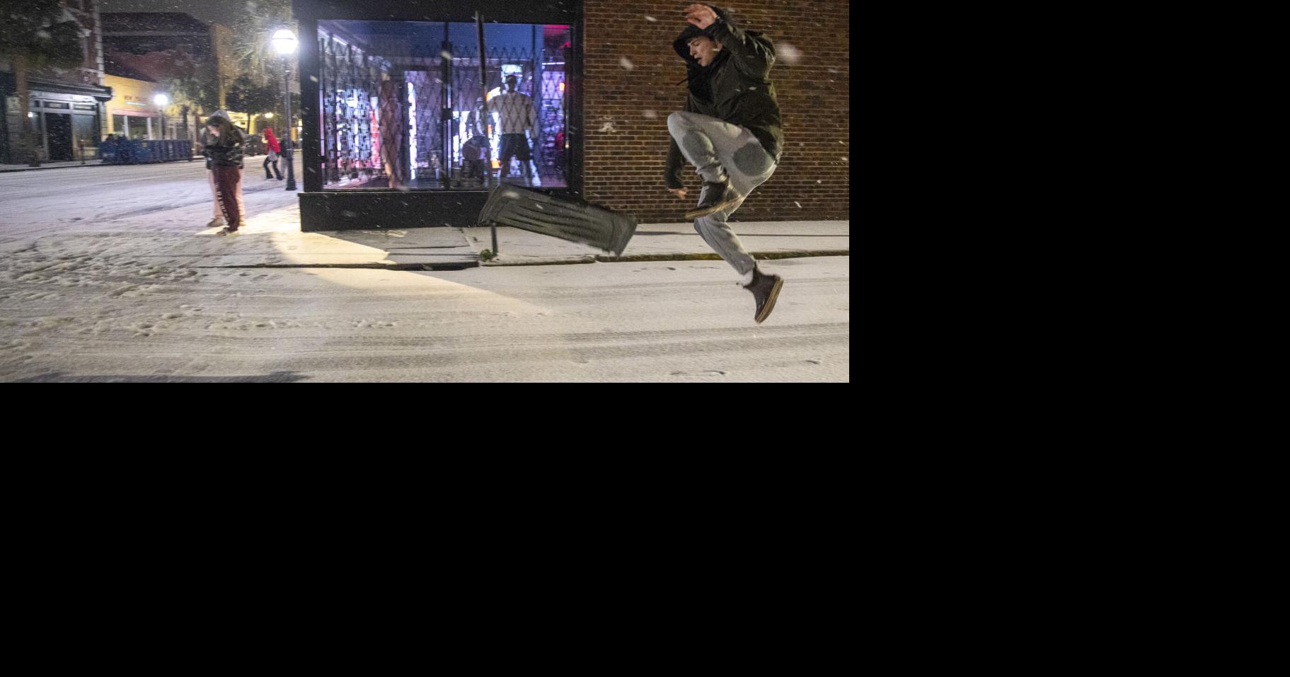 Charleston residents ski, snowboard downtown after snowfall | News ...