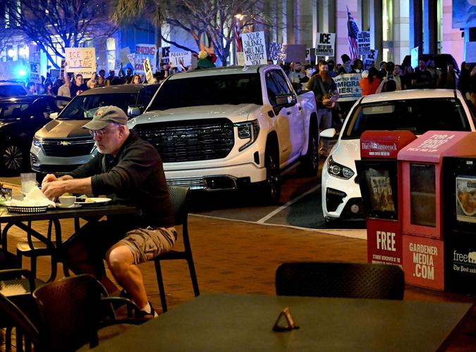 Protestors march Columbia, SC Main Street after ICE shooting