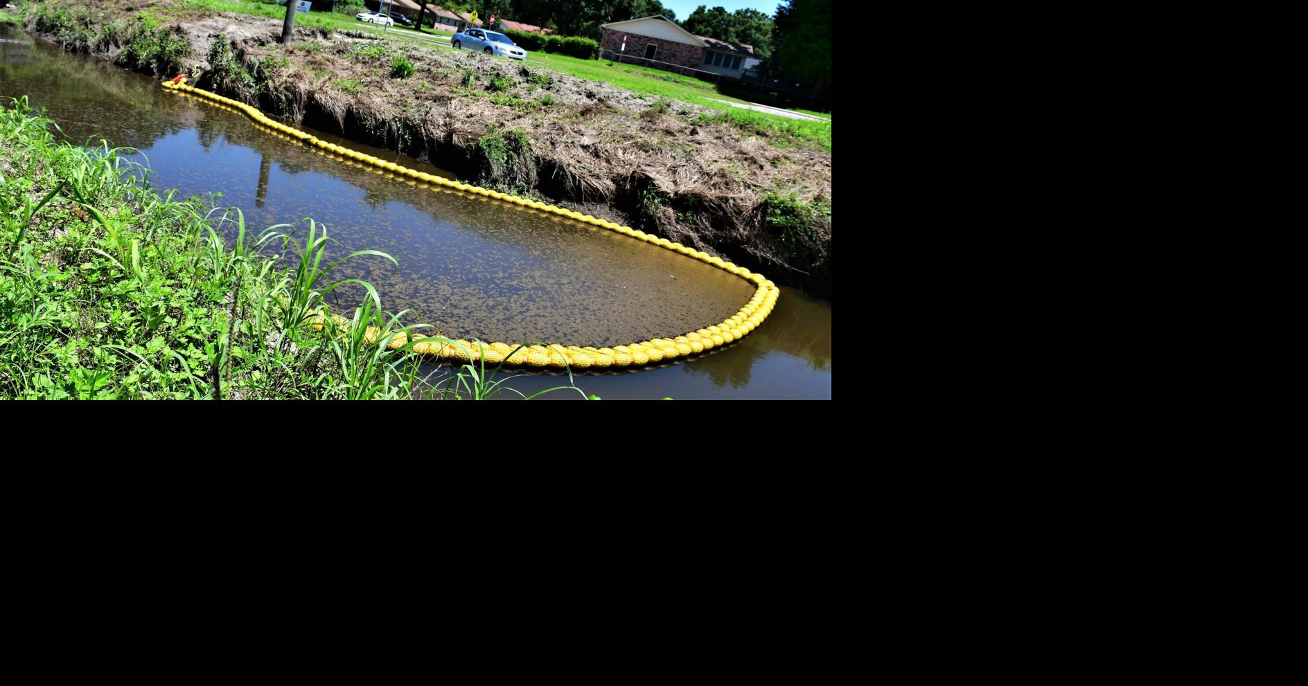 Water straining device installed in College Park canal. | News ...