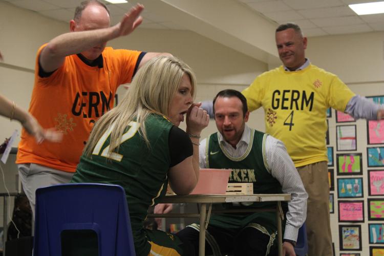 Local students learn proper hand hygiene skills with demo