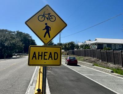 New bike path parking lot to improve trail access and safety