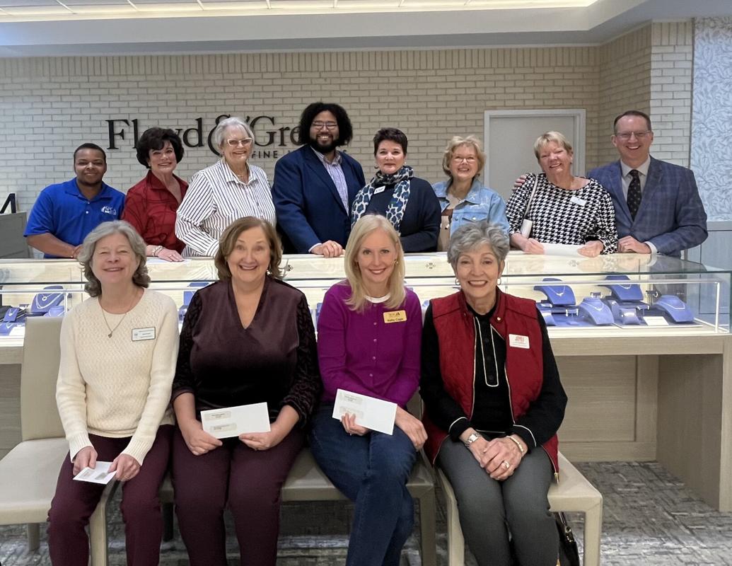 More than 25 charities receive checks from Floyd & Green
