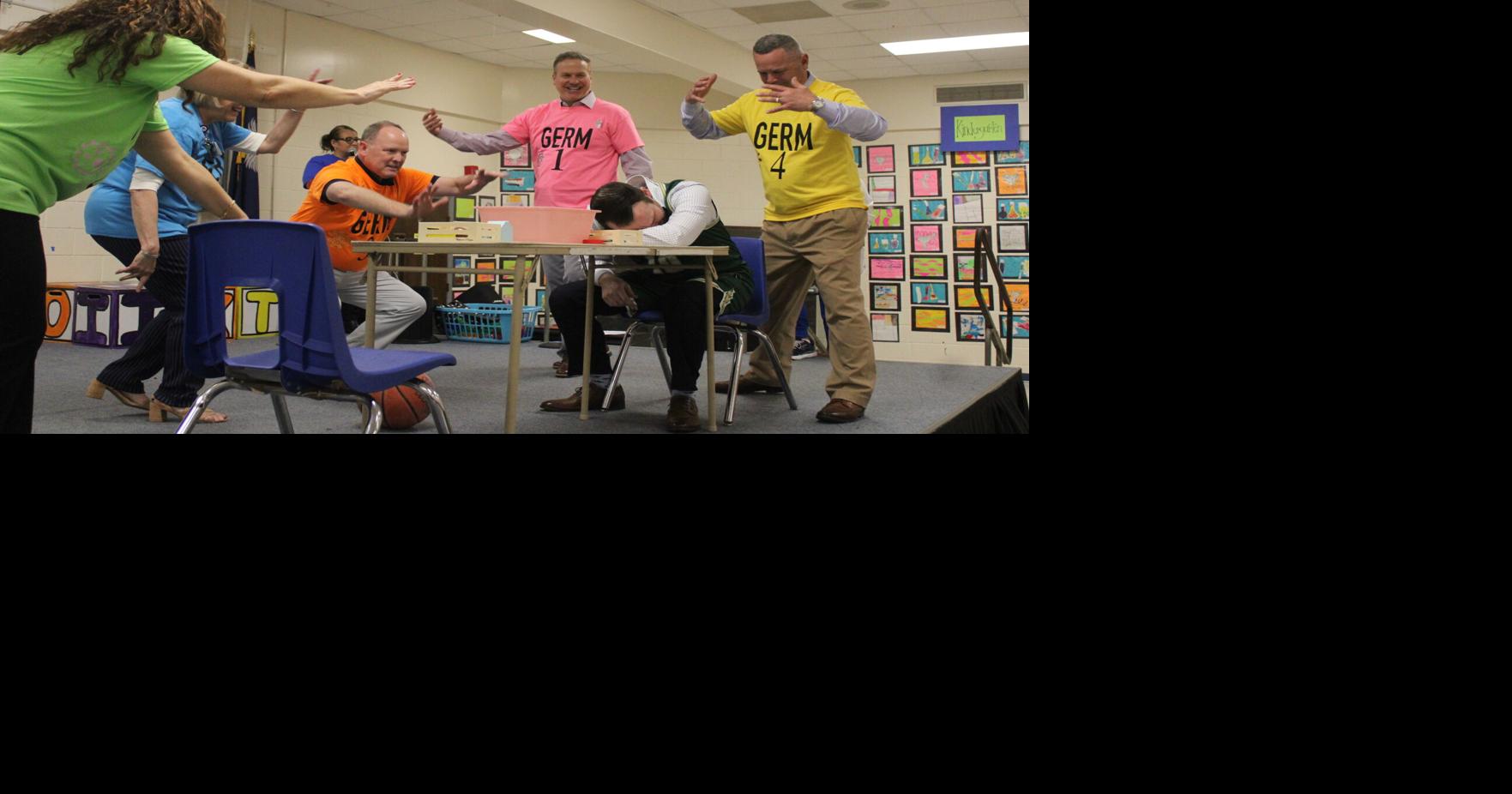 Local students learn proper hand hygiene skills with demo