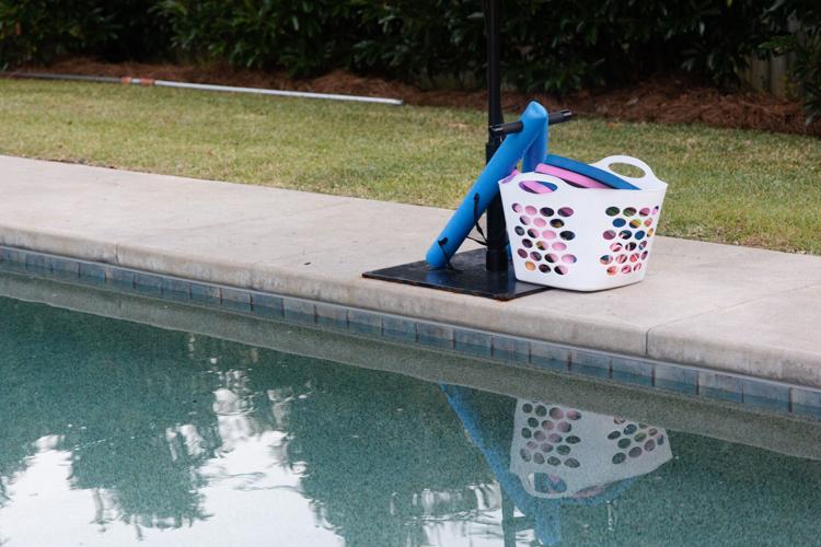 A swim instructor has sued Columbia after denied license