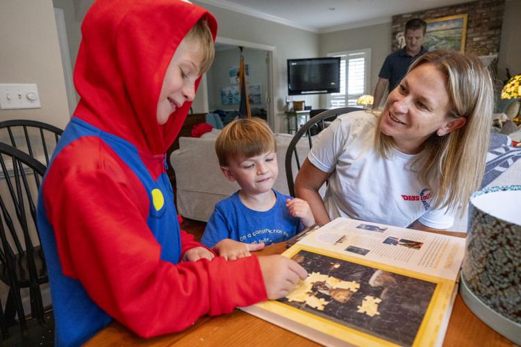 Photos: Brothers with Dias Logan syndrome find support at home