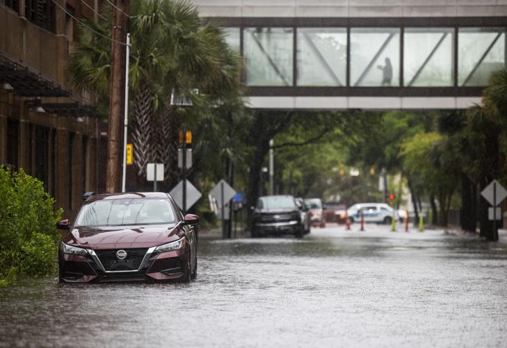 Charleston closes streets as rain, flash floods soak region