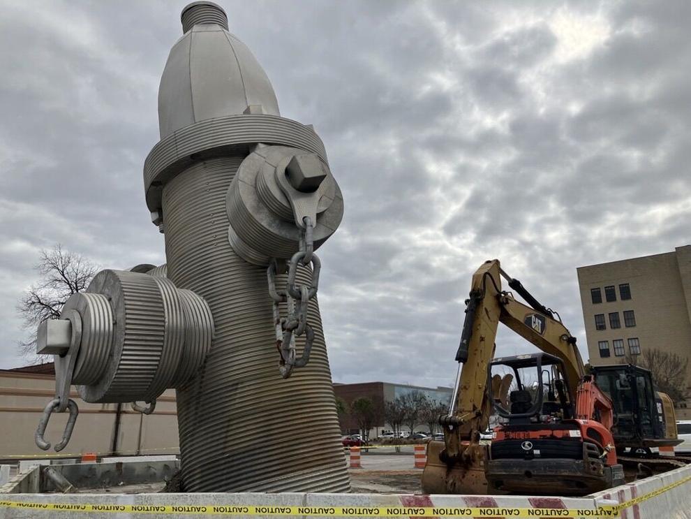 Busted Plug, Columbia's 40-foot fire hydrant sculpture, being moved and ...
