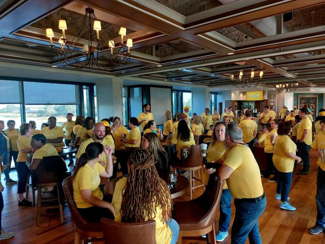 REV employees spend day serving community | Business | postandcourier.com