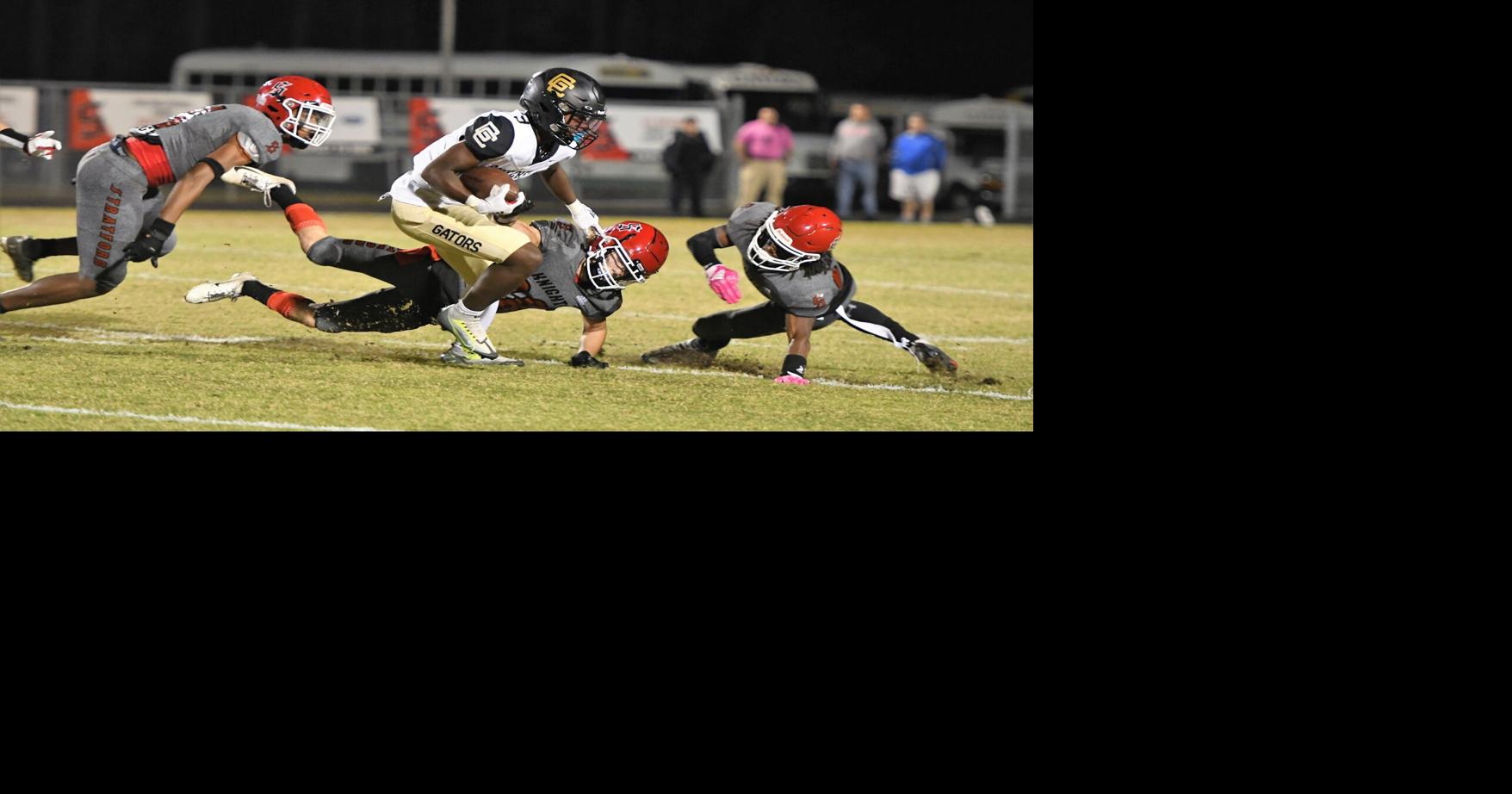 Gators hang on to win rivalry matchup