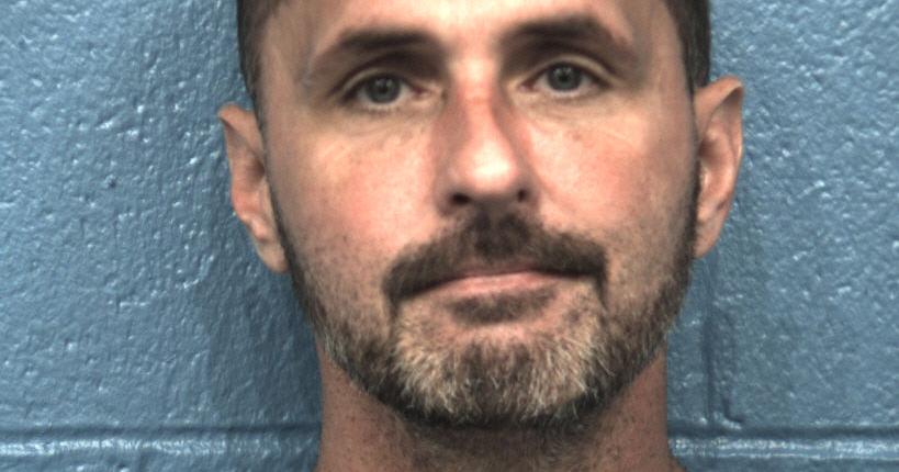 A makeshift dummy, nearly $50,000 in cash and guns part of the story ...