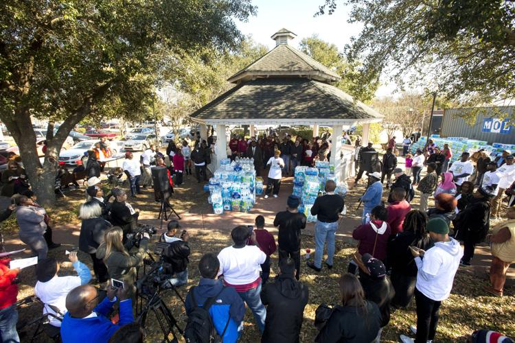 Denmark residents march downtown with advocates of Flint and Virginia ...