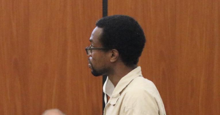 Judge won't reduce sentences of men who killed U.S. attorney
