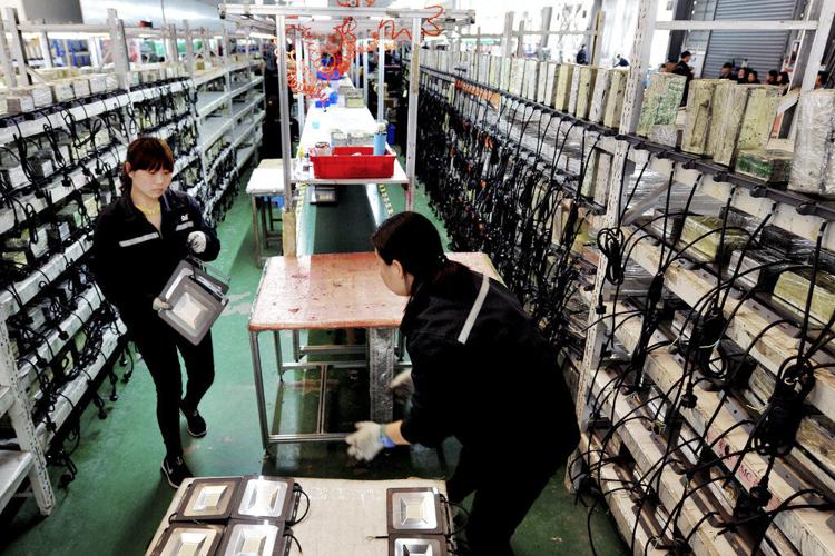 China's factory activity contracts for 8th month in November despite ...