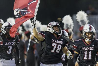 Coaches ask High School League to pause football season