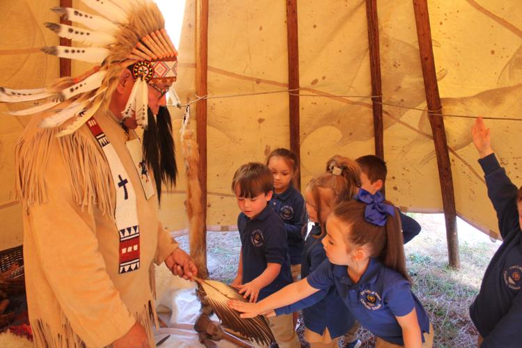 Children learn about Lakota culture during school visit