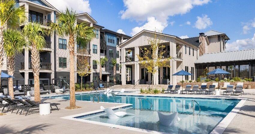 Woodfield Development opens apartment complex