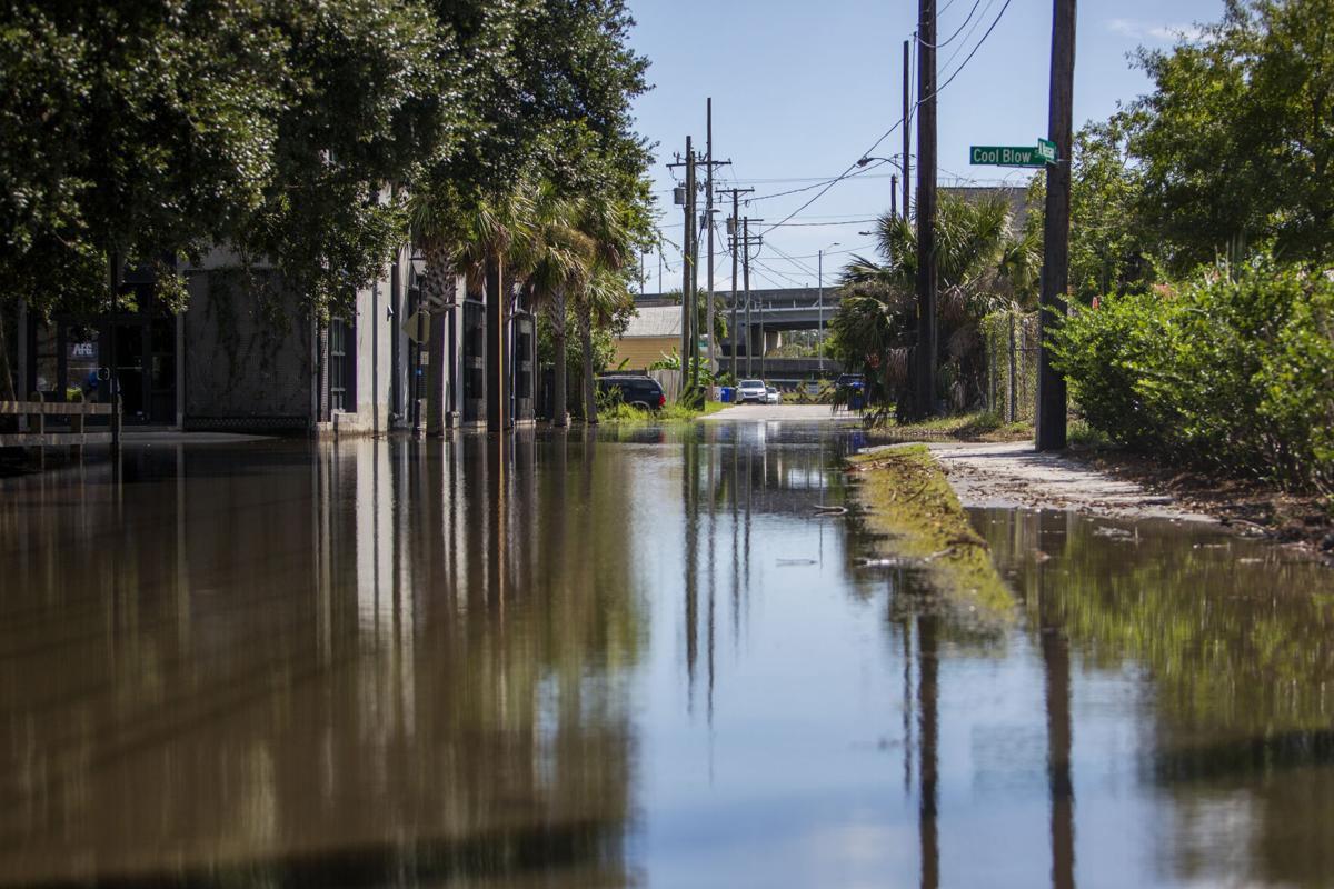 Photos: High tides drive 'sunny day' flooding in Charleston area ...