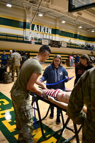 Recruiters describe Army careers to students at Aiken High