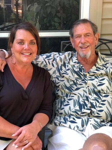 Clinging to life in a COVID ward, her dad died down the hall. She lived ...