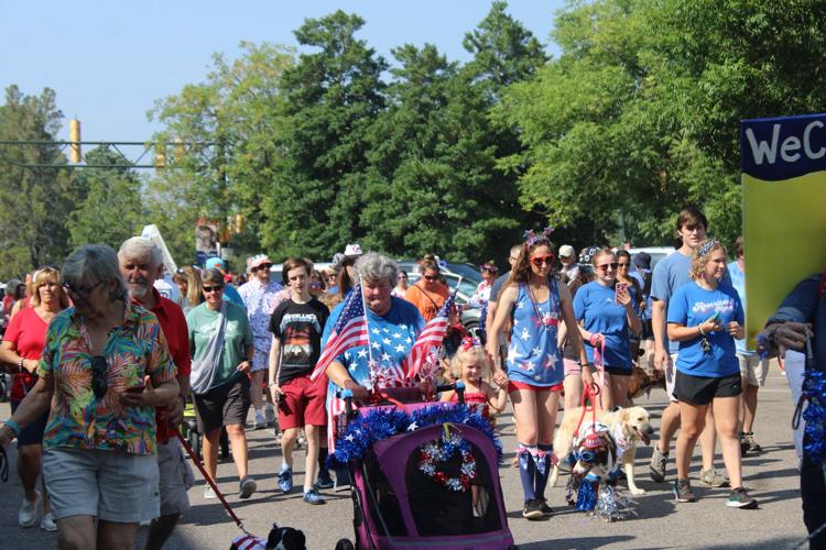 Patriotic dogs stroll downtown Aiken for parade