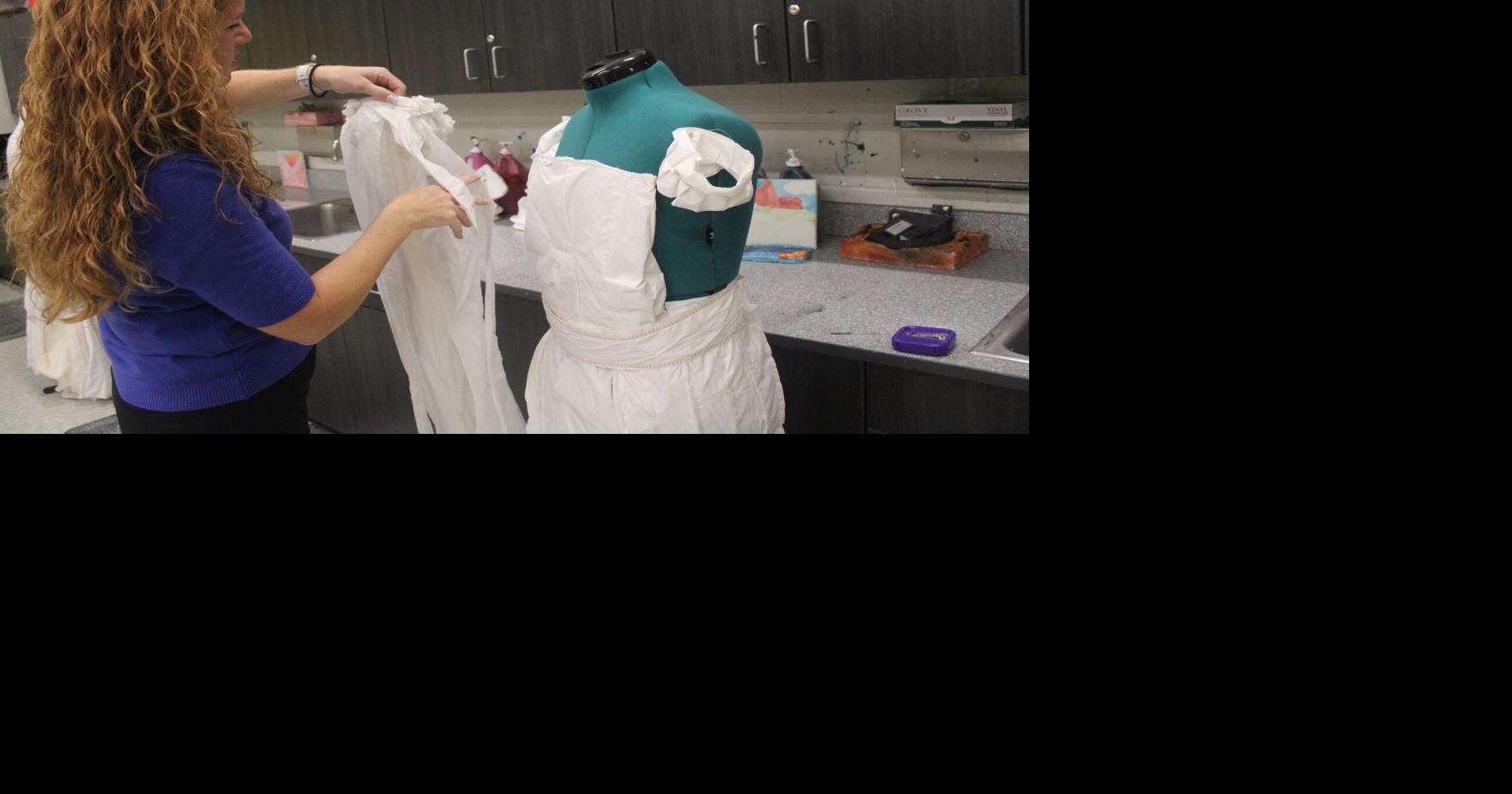 Local students create dress made out of school toilet paper