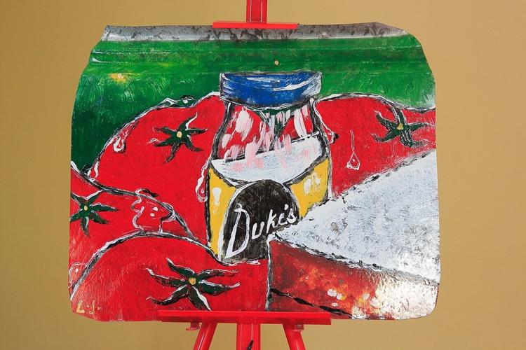 Folk artist Leonard Jones giving old tin new life