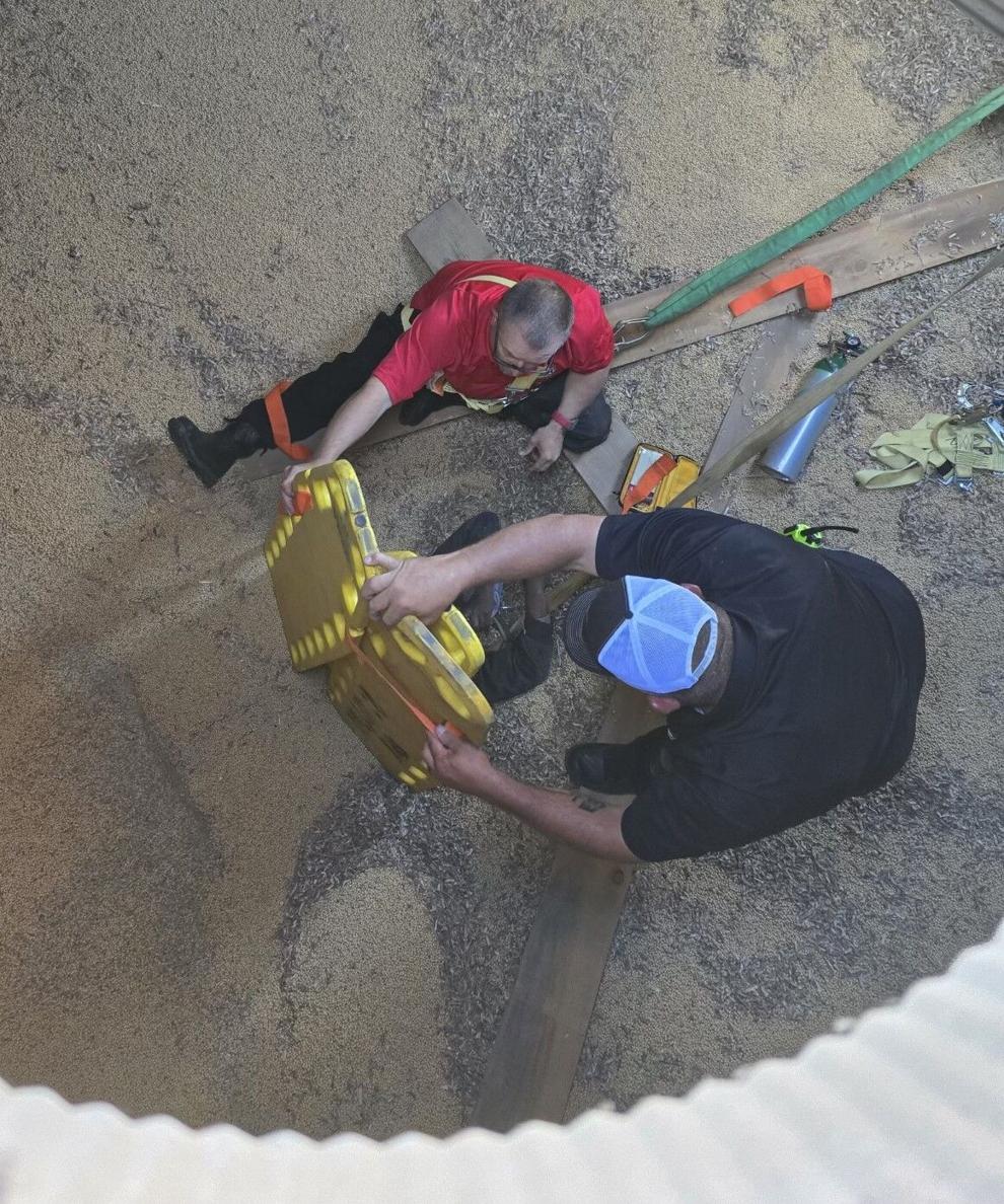 Rescue crews respond to man trapped in grain bin