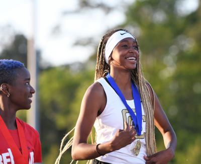 FEMALE TRACK AND FIELD ATHLETE OF YEAR: Determined Jones a winner for ...
