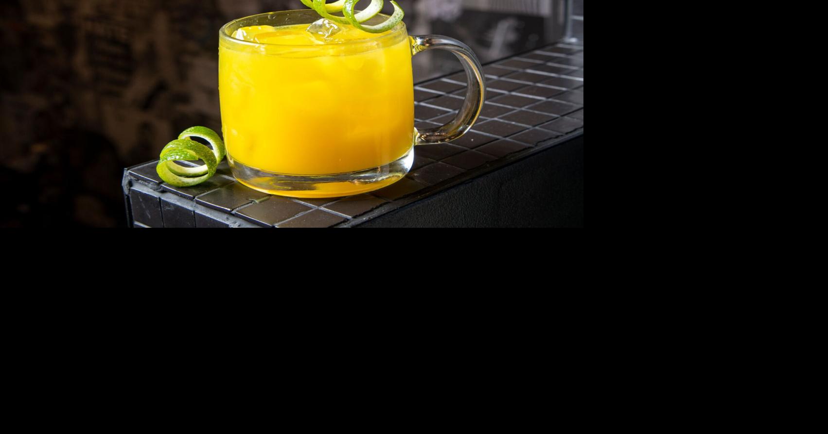 Neon Tiger's turmeric mule pairs nicely with vegan pizza | Food ...