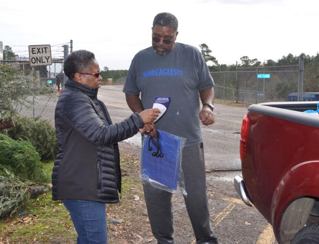 First tarp giveaway event generates enthusiastic response | News ...