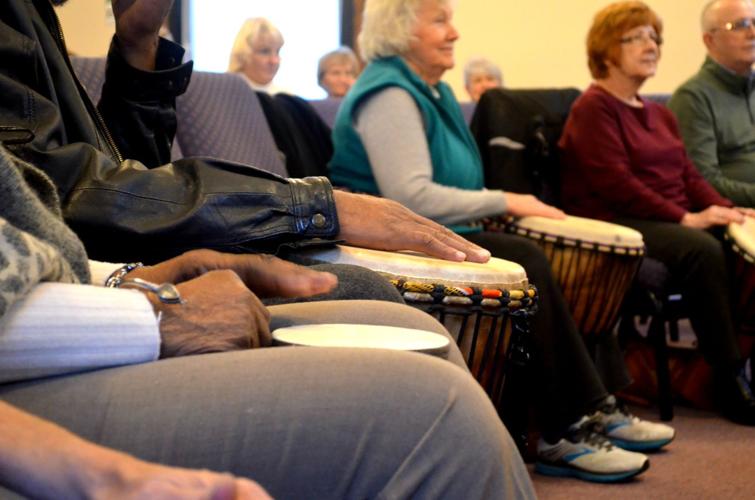 Drumming group delights dozens with a West African drumming demonstration