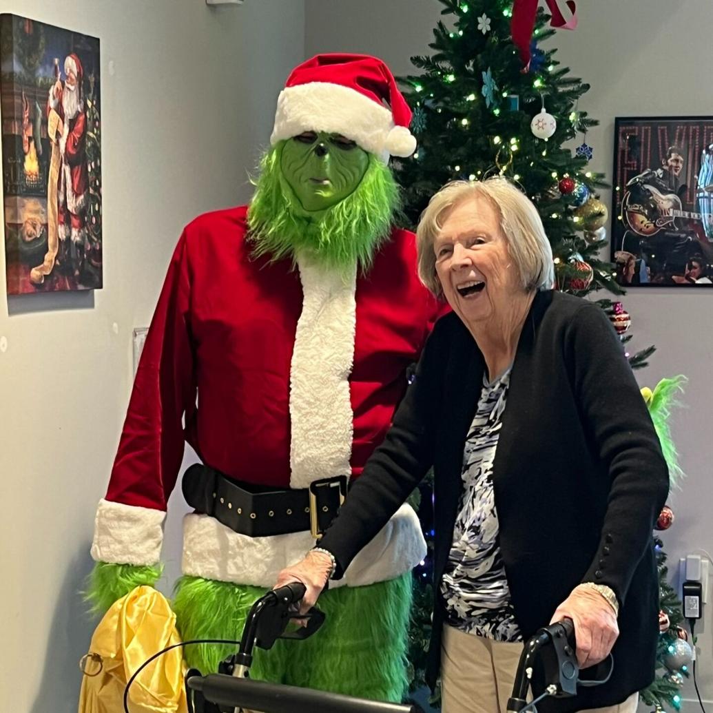 Grinch visit, line dancing bring holiday cheer to memory care residents