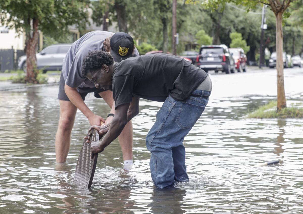 Record rainfall, flash flooding inundate downtown Charleston