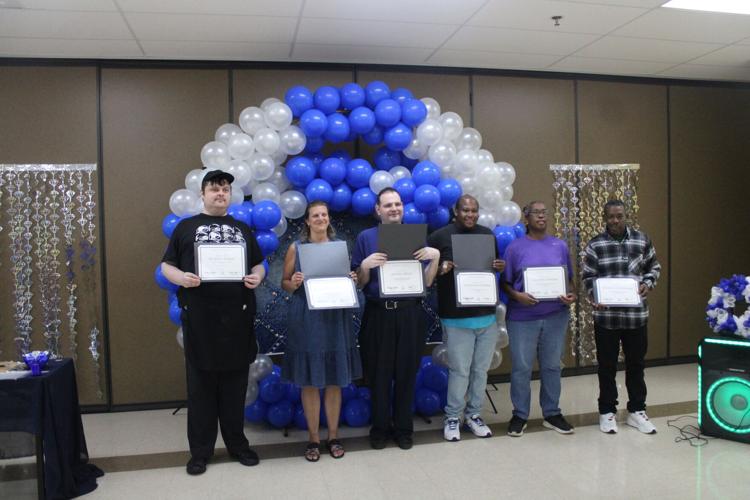 Employees honored at Denim and Diamonds banquet