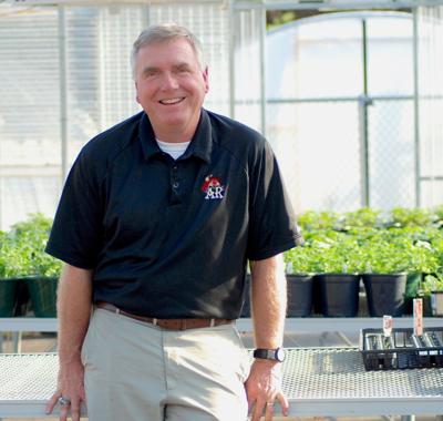 Bobby Behr Helping students, athletes, vegetables grow